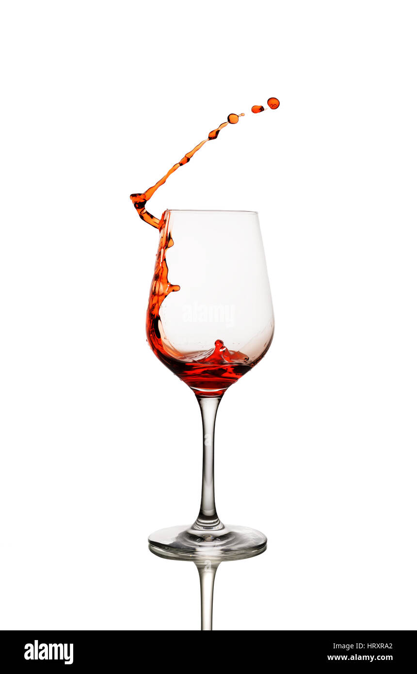 Red wine splashing from glass isolated on white background Stock Photo ...