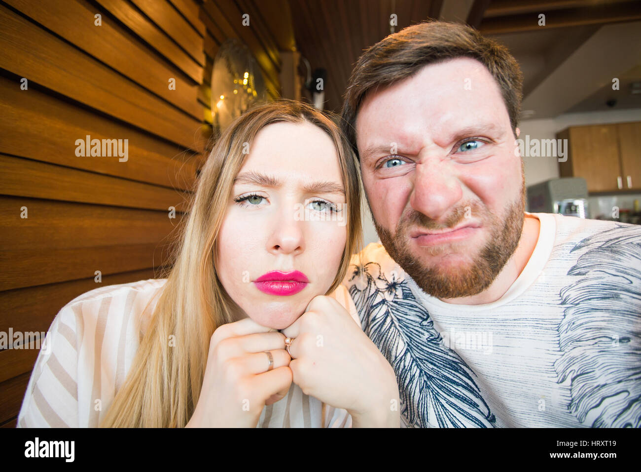 Close up photo of angry man and woman Stock Photo - Alamy