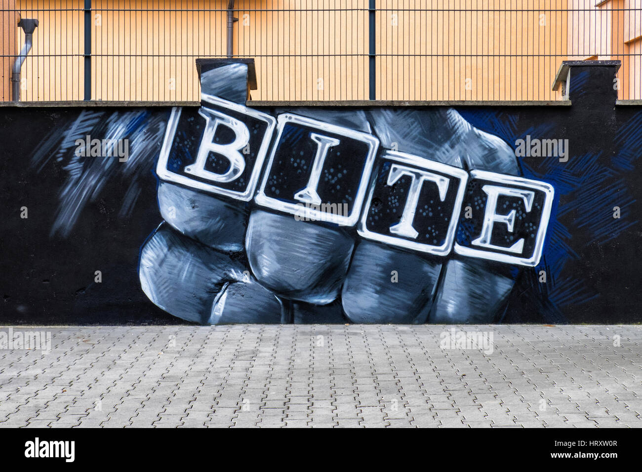 Fist with bite letters hi-res stock photography and images - Alamy