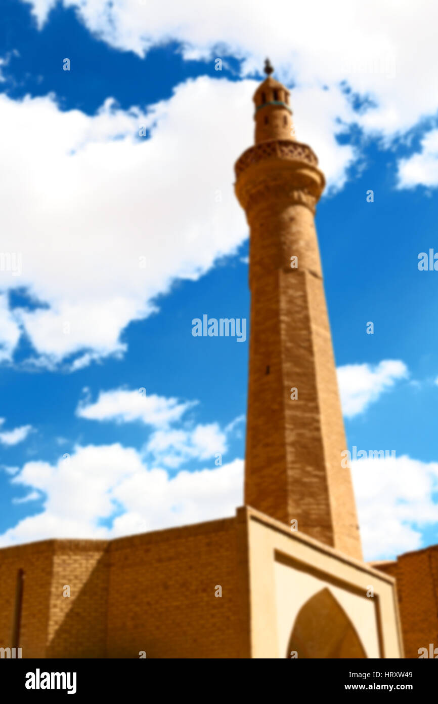 blur in iran blur islamic mausoleum old architecture mosque minaret near the sky Stock Photo - Alamy