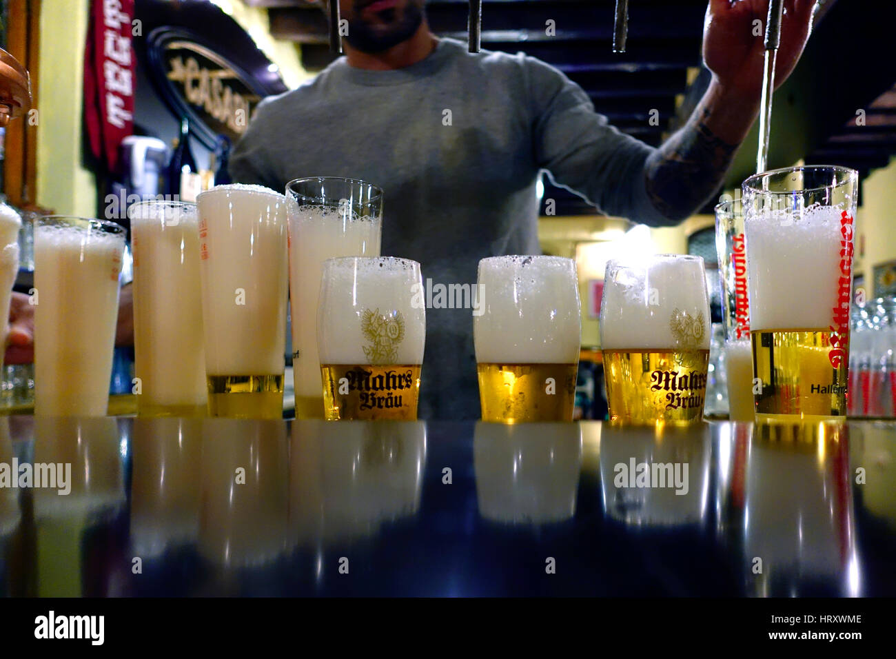 Bartender pouring alcohol from hi-res stock photography and images - Alamy