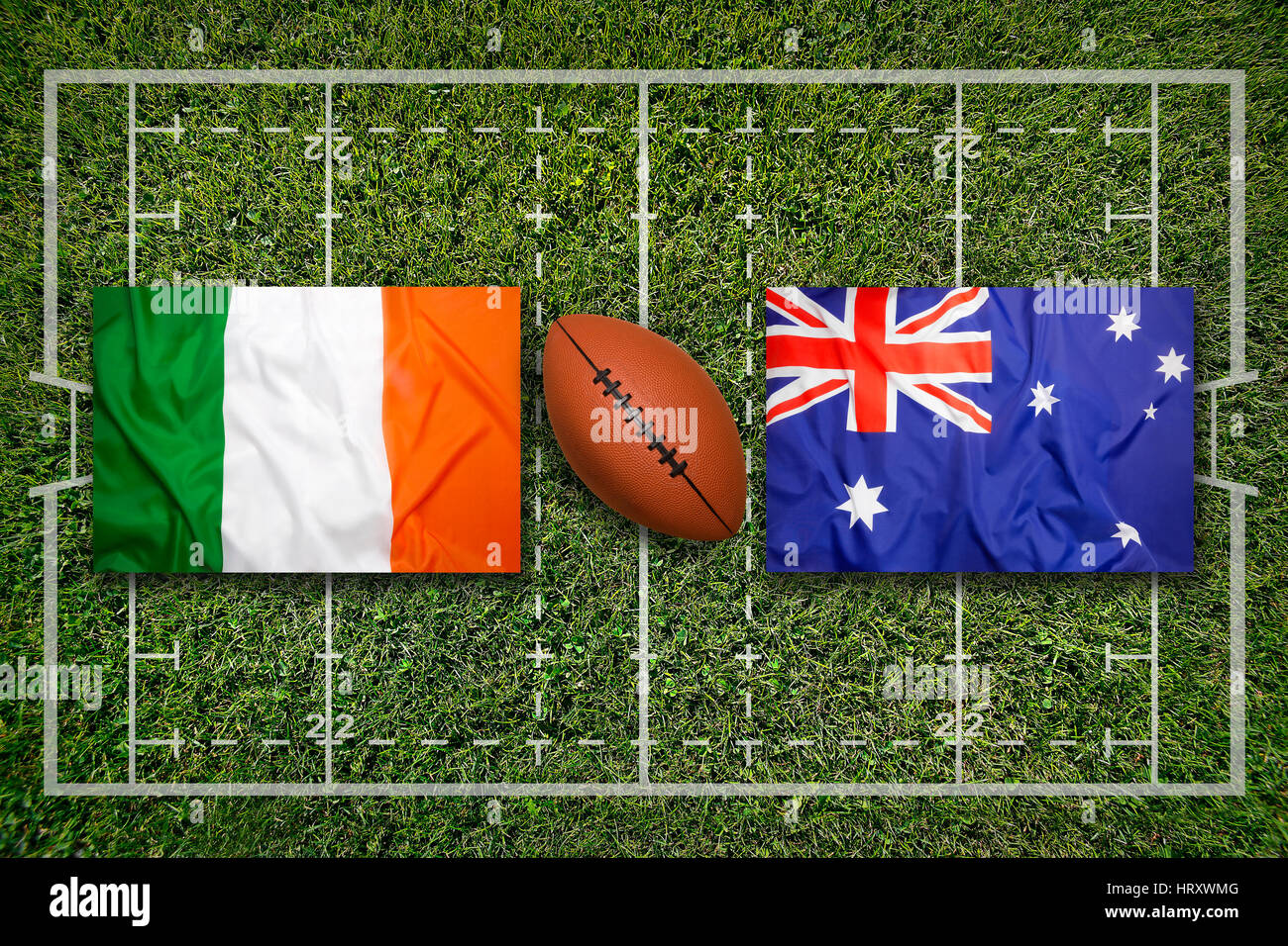 Ireland vs. Australia flags on green rugby field Stock Photo - Alamy