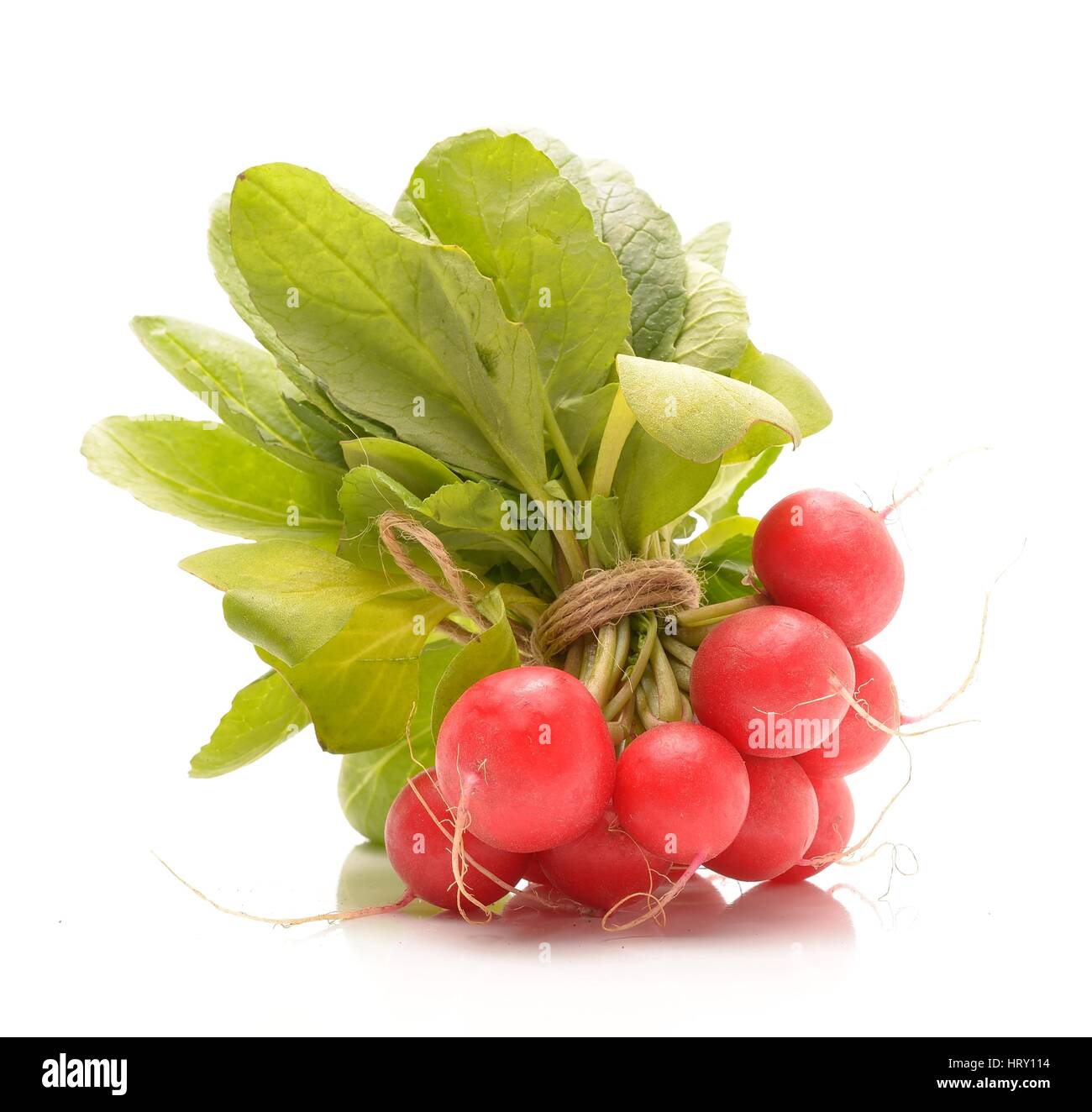 Fresh radishes on a white background Stock Photo - Alamy