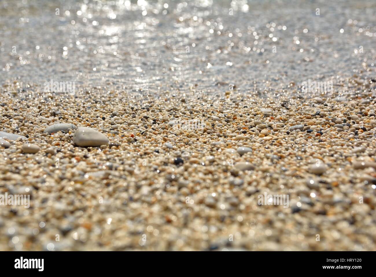 Sandy stone background for summer. Sand beach texture Stock Photo - Alamy