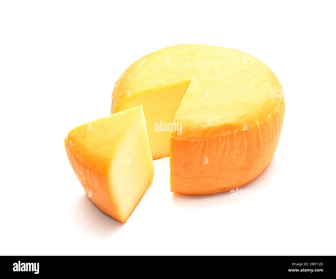 Wheel of traditional cheese isolated on white Stock Photo - Alamy