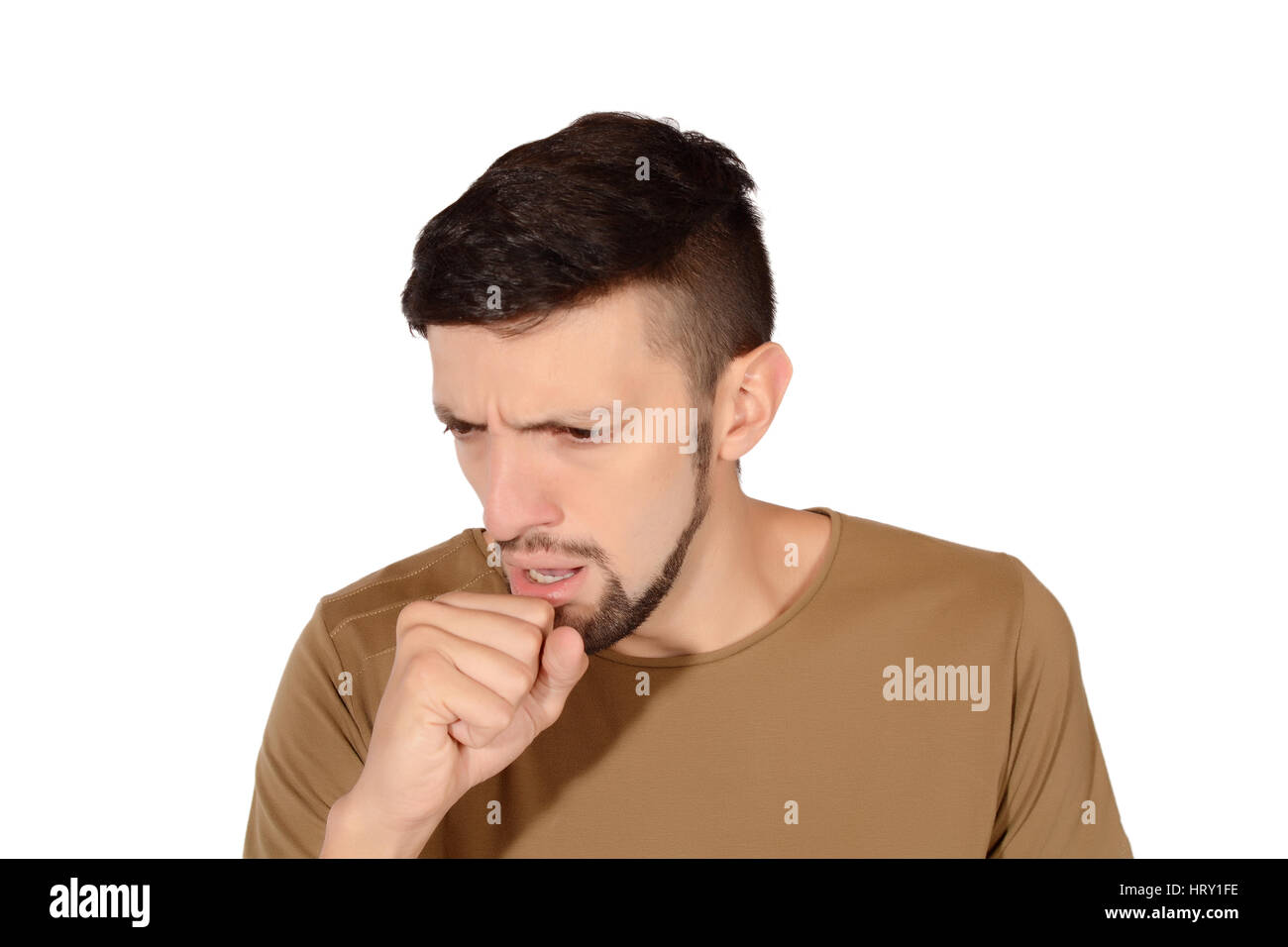 Portrait of a young man coughing. Isolated white background Stock Photo ...