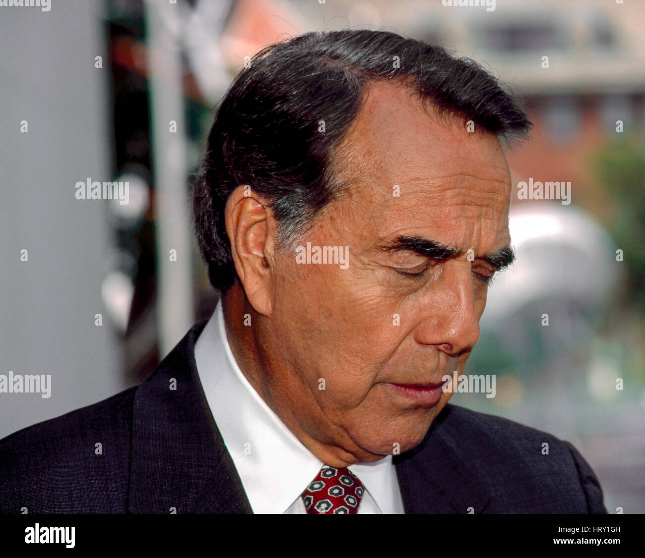 Senator Robert Dole Republican from Kansas talks with reporters outside ...