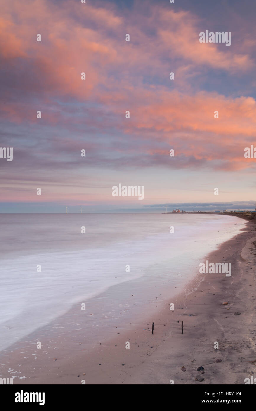 Cambois beach, Northumberland, at sunset and high tide along the North ...
