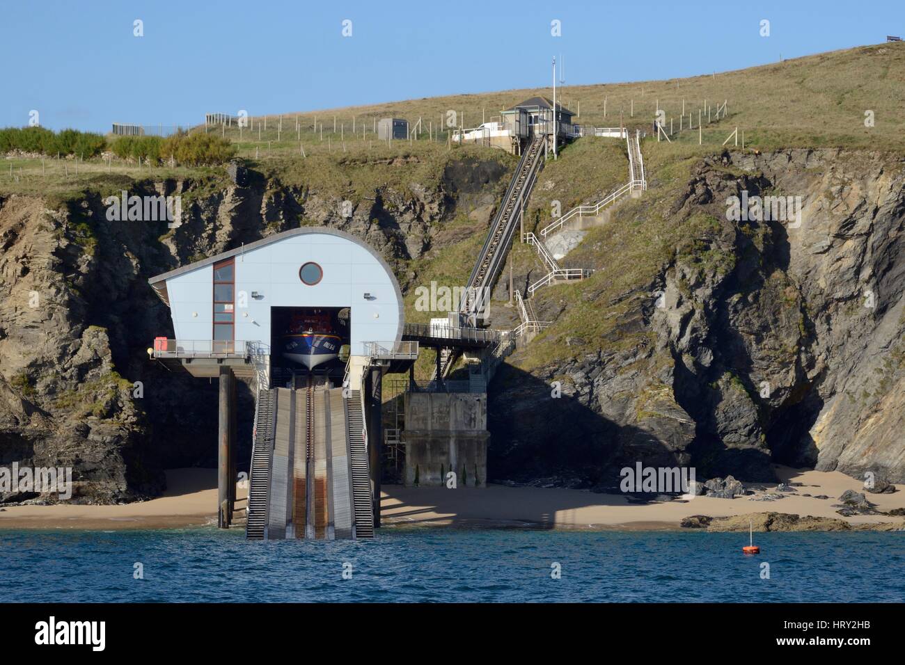 RNLI Lifeboat station on Trevose Head, viewed from the sea, Cornwall ...