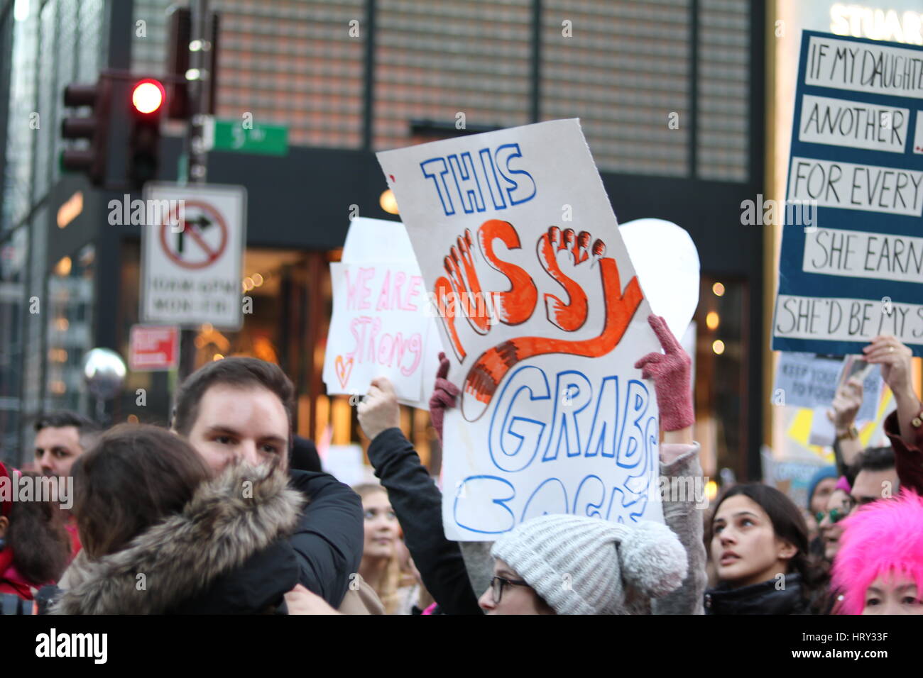 People walking with protest signs hi-res stock photography and images ...