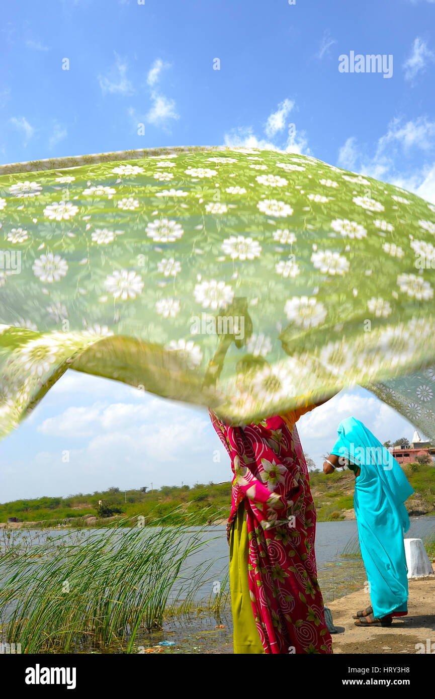 Scarf blowing in wind hi-res stock photography and images - Alamy