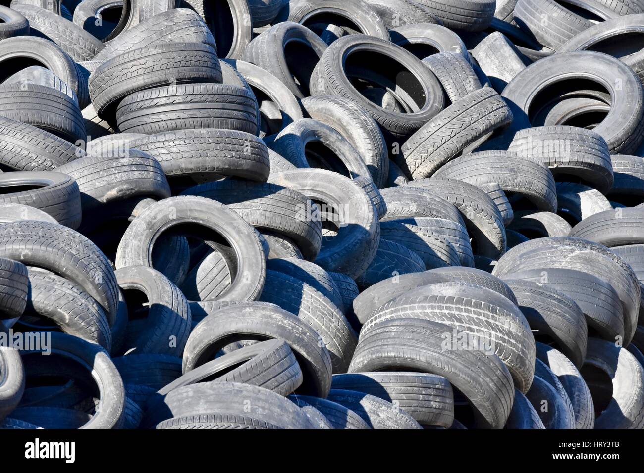 Used tire graveyard Stock Photo - Alamy