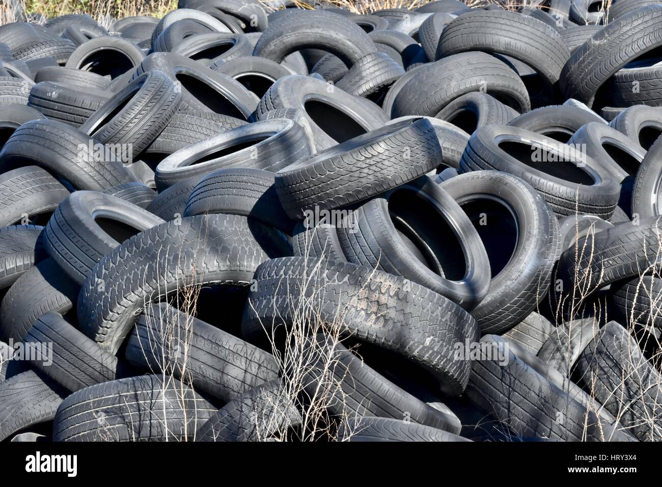 Used tire graveyard Stock Photo - Alamy