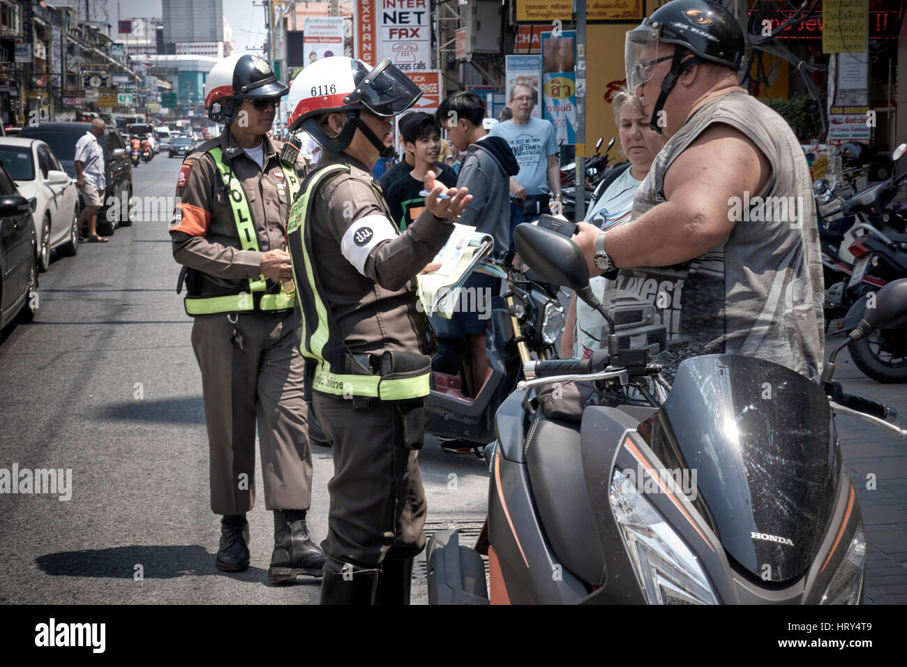Thailand police road side checkpoint with officers checking motorists ...