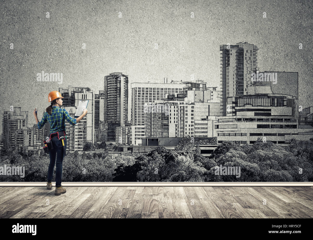 Back view of engineer woman with folder and sketches of construction ...