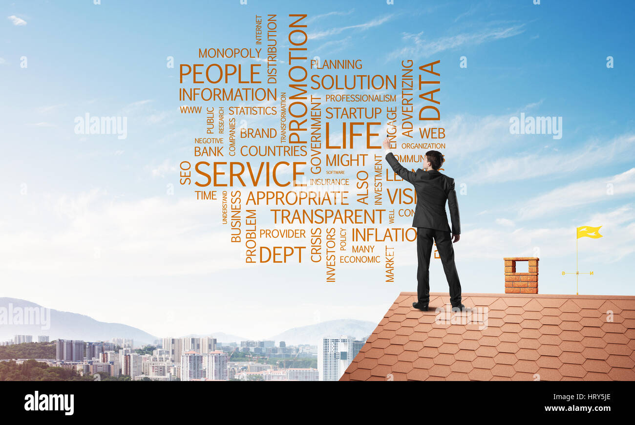 Businessman writing business related and success conceptual words ...