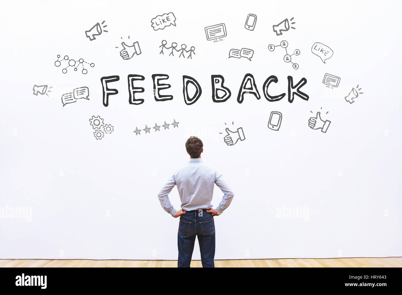 feedback concept, business man looking at the drawn sketch with icons ...