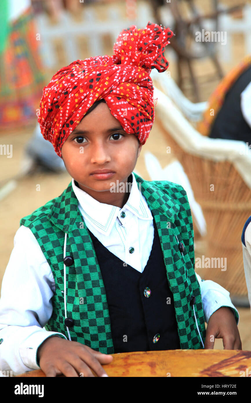 Cute Rajasthan boy with brightly coloured turban (Traditional Cap ...