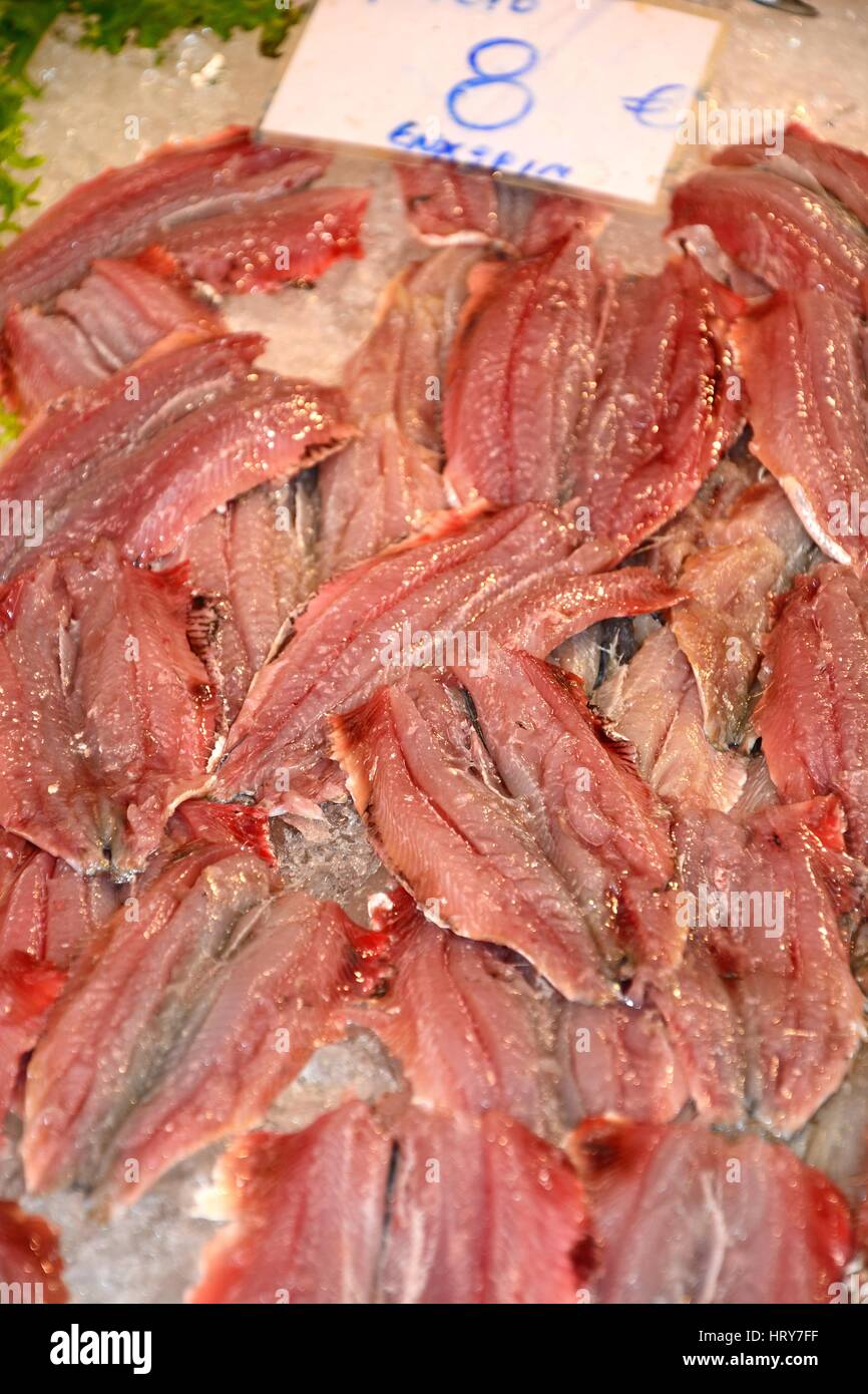 Fresh fish for sale on a market stall along an alleyway in the city ...