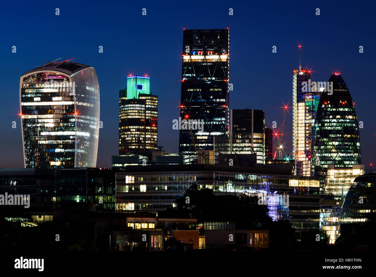 The night skyline of London city with view of the Gherkin, London, UK ...