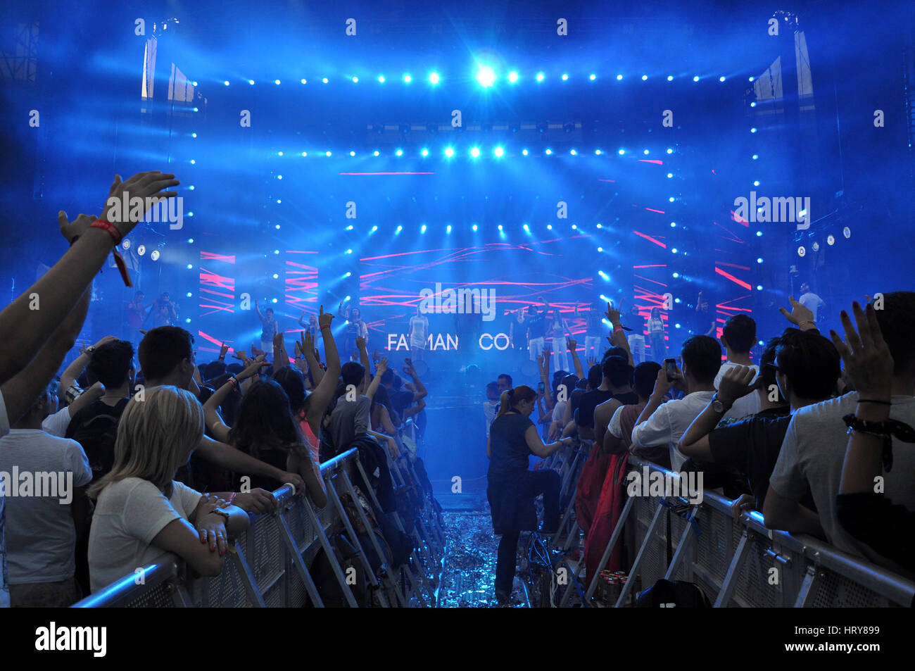 CLUJ NAPOCA, ROMANIA – AUGUST 2, 2015: Crowd of party people having fun ...