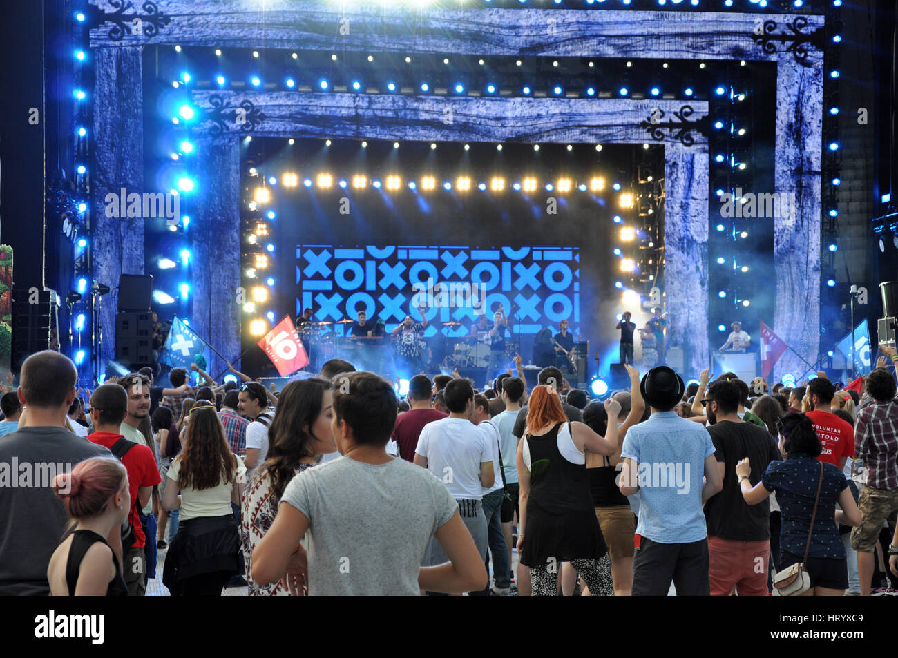 CLUJ NAPOCA, ROMANIA – AUGUST 2, 2015: Crowd of cheerful people having ...