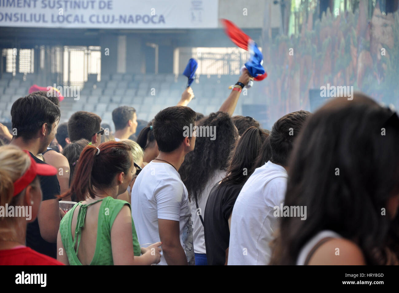 CLUJ NAPOCA, ROMANIA – AUGUST 2, 2015: Crowd of cheerful people having ...