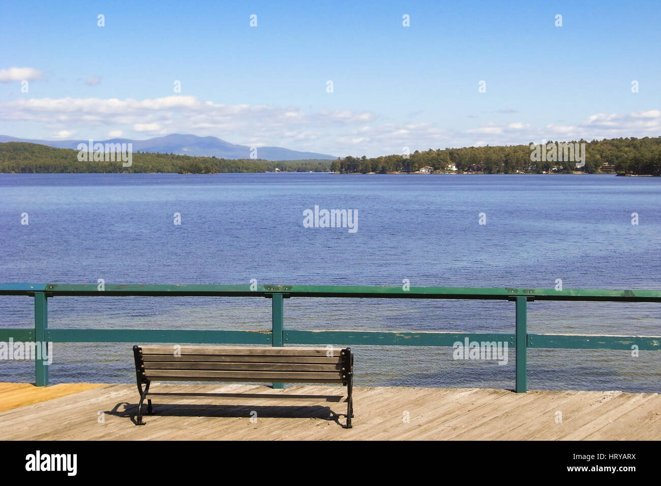 Bench at the shore of lake Winnepesaukee, New Hampshire, United States ...