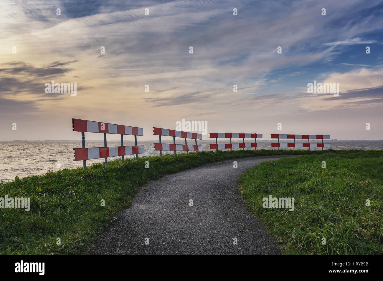 Road fence at the bicycle path Stock Photo - Alamy
