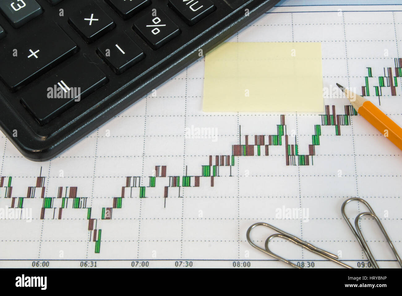 Finance graph on white background with calculator, pencils, sticker ...