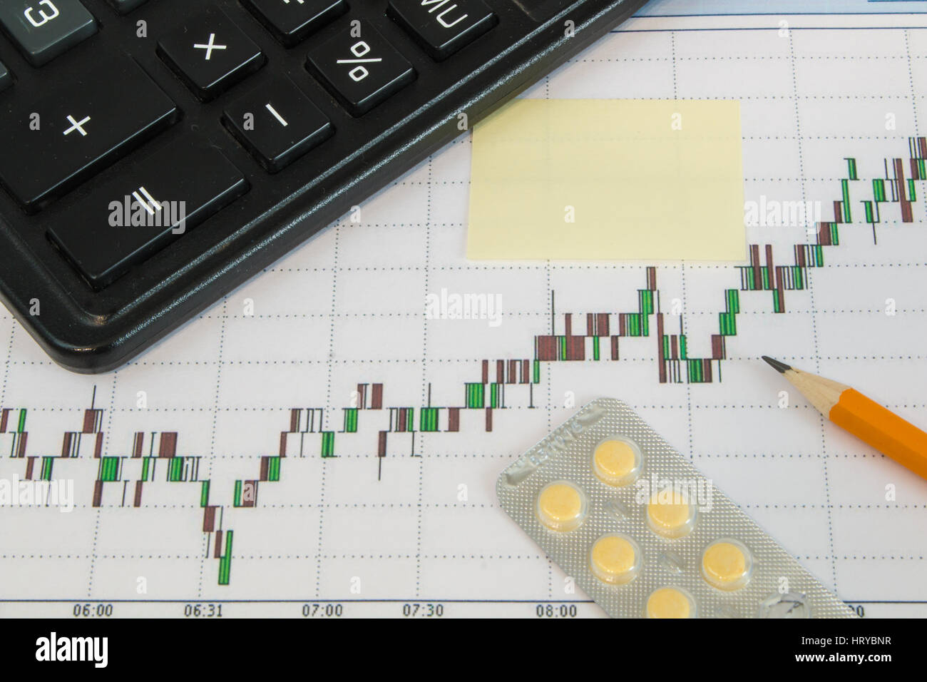 Finance graph on white background with calculator, pencils, sticker ...