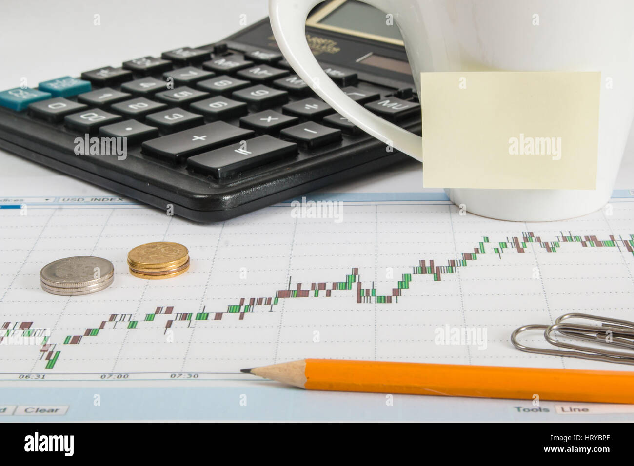 Finance chart on white background with calculator, pencils, sticker ...