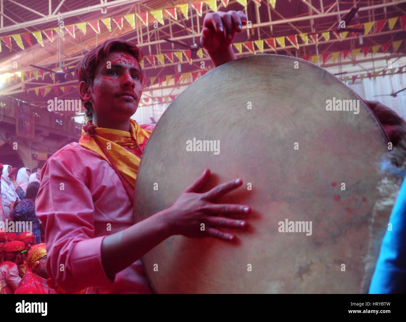 Mathura, India. 05th Mar, 2017. A Hindu devotee take part in Laddu maar ...