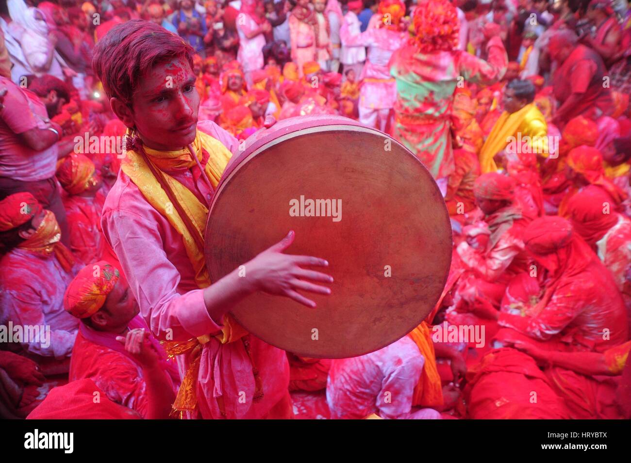 Mathura, India. 05th Mar, 2017. A Hindu devotee take part in Laddu maar ...