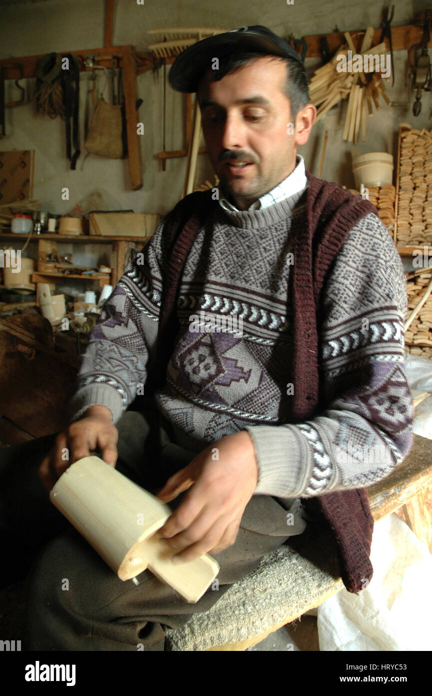 PATRAHAITESTI - CCA JUNE: Carpenter handcrafting a traditional Romanian ...