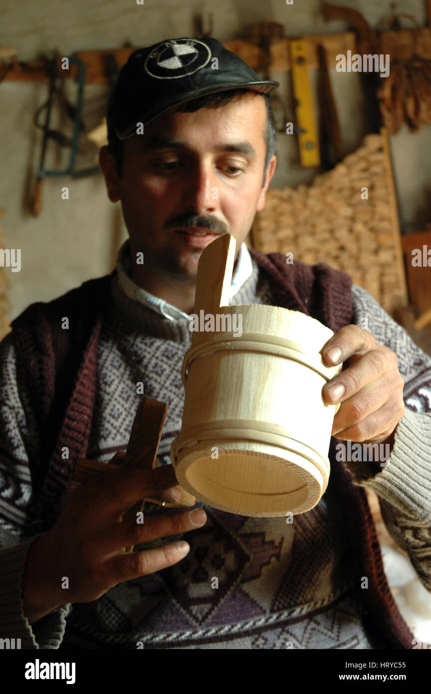 PATRAHAITESTI - CCA JUNE: Carpenter handcrafting a traditional Romanian ...