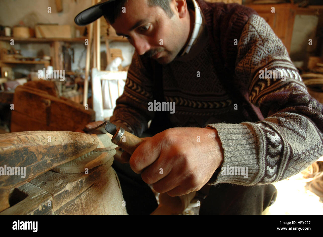PATRAHAITESTI - CCA JUNE: Carpenter handcrafting a traditional Romanian ...
