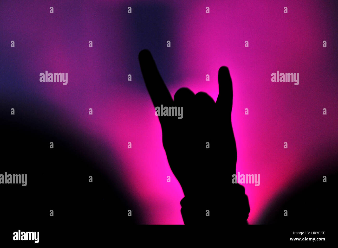 Hand doing rock sign at a rock concert Stock Photo - Alamy