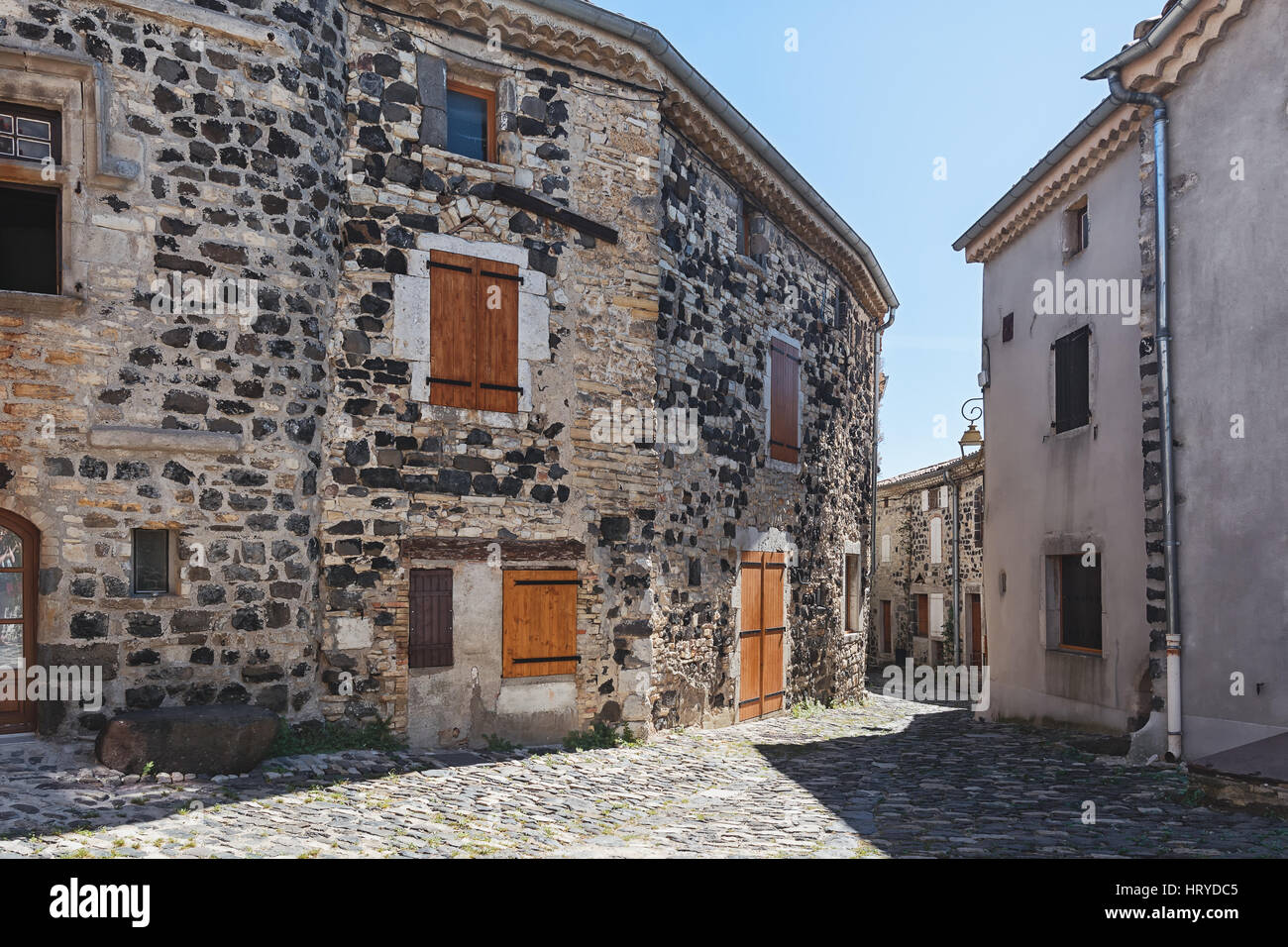 The narrow street in the picturesque village of Mirabel Ardèche, France ...