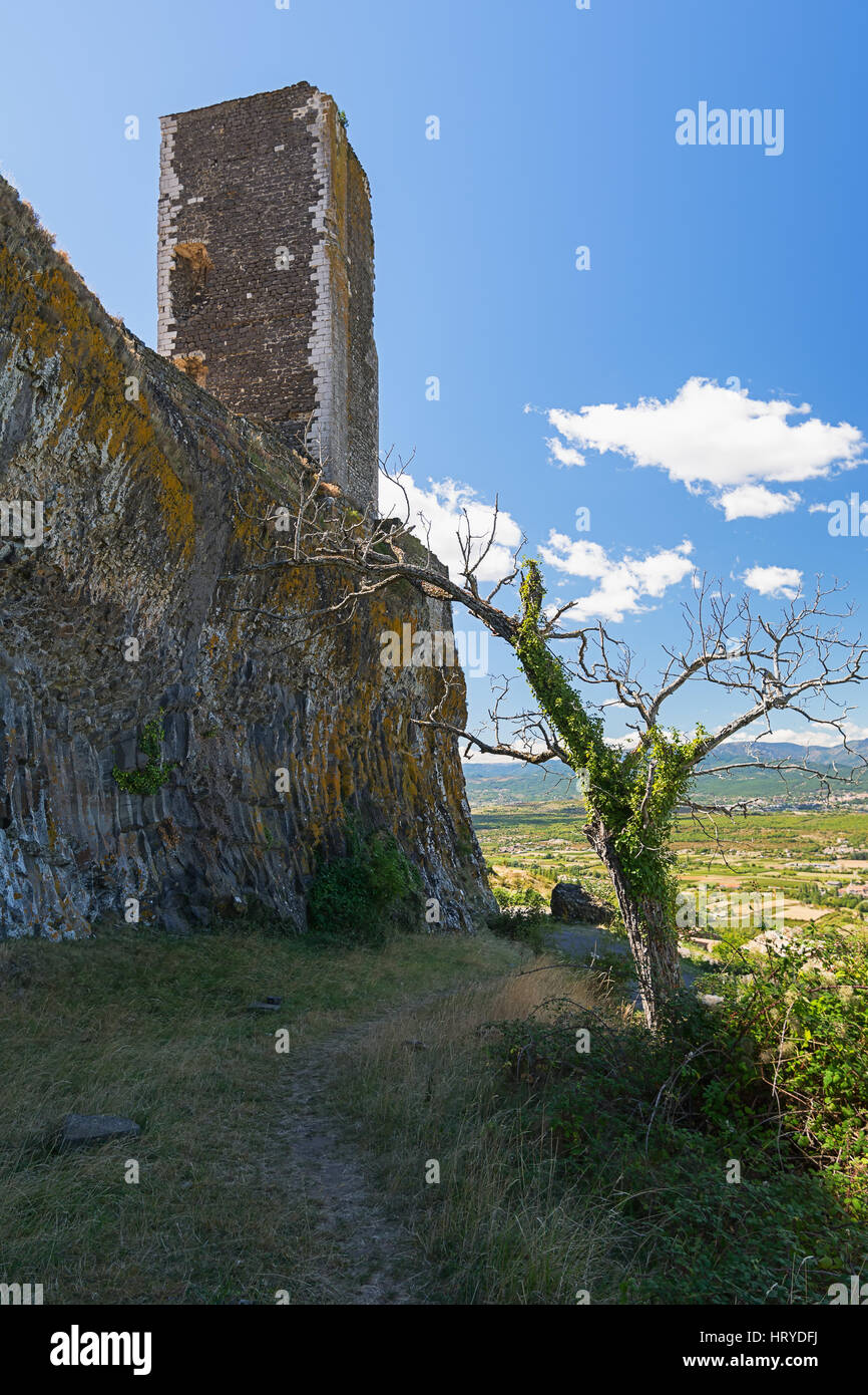 Basalt tower of castle ruin in Mirabel, Ardeche mountains, France Stock ...