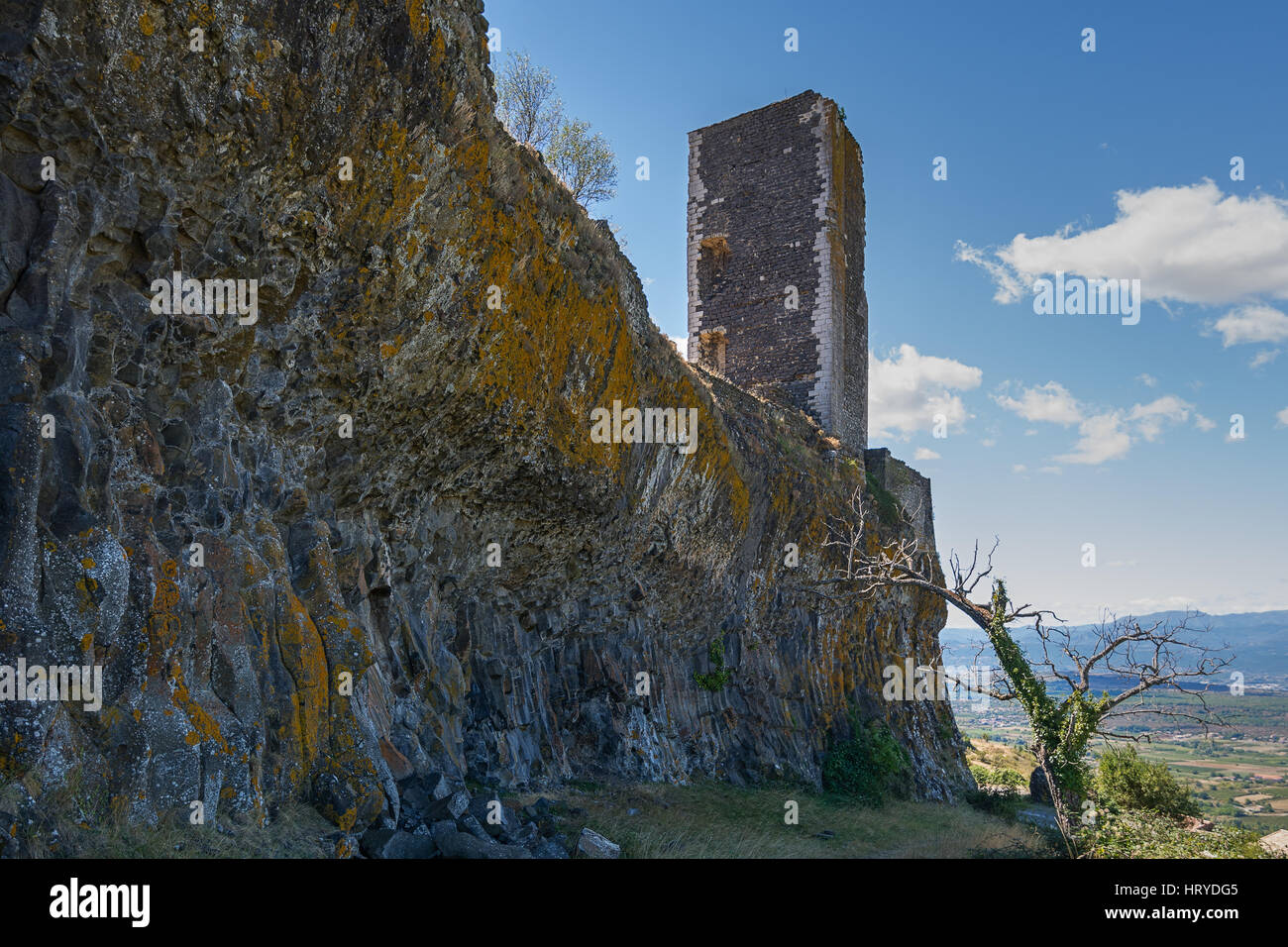 Basalt tower of castle ruin in Mirabel, Ardeche mountains, France Stock ...