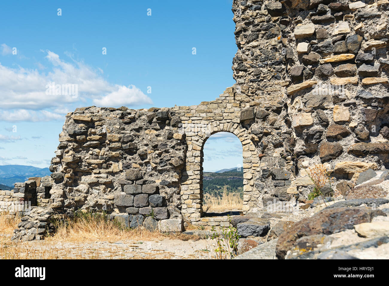 Basalt tower of castle ruin in Mirabel, Ardeche mountains, France Stock ...