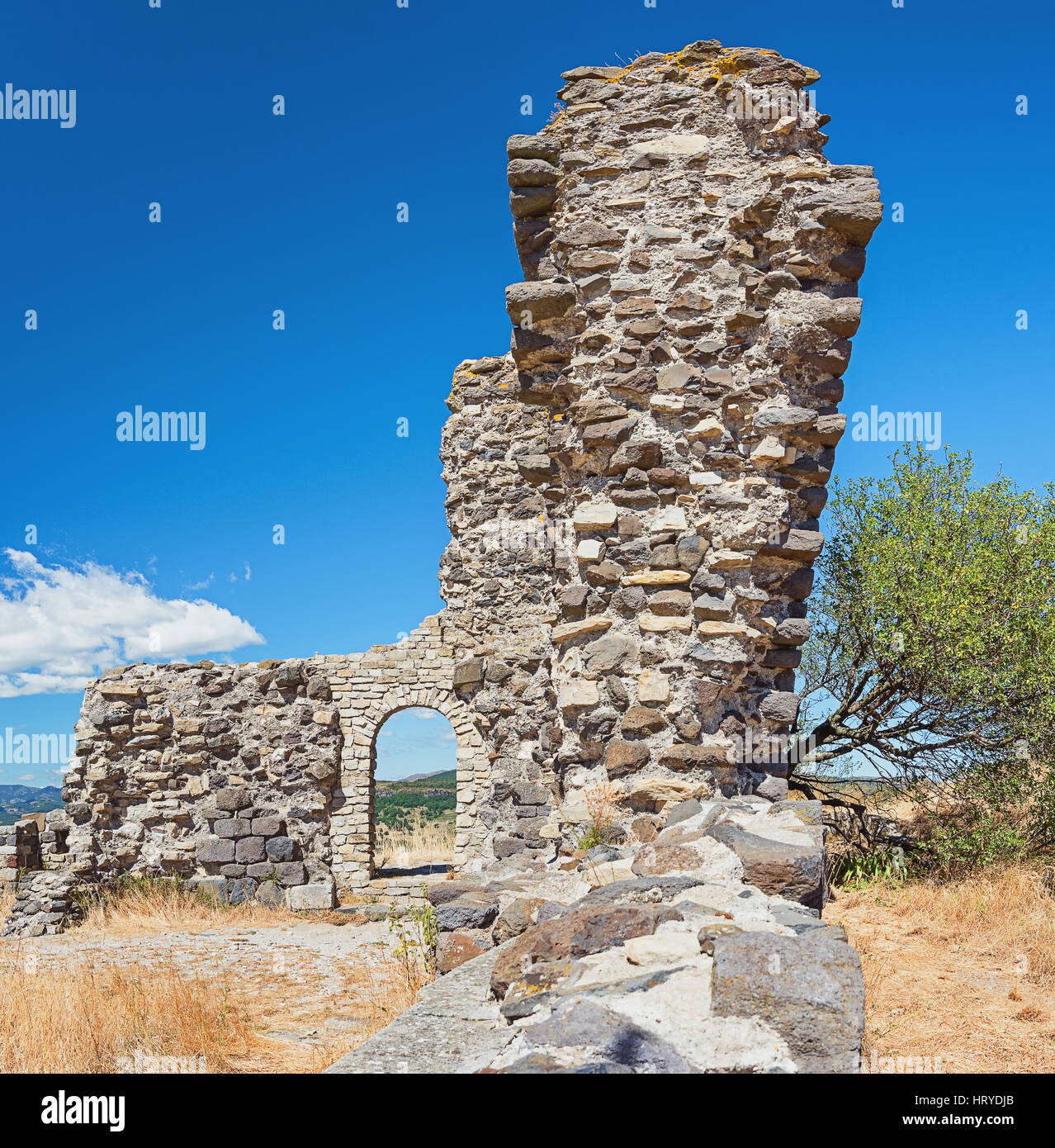 Basalt tower of castle ruin in Mirabel, Ardeche mountains, France Stock ...