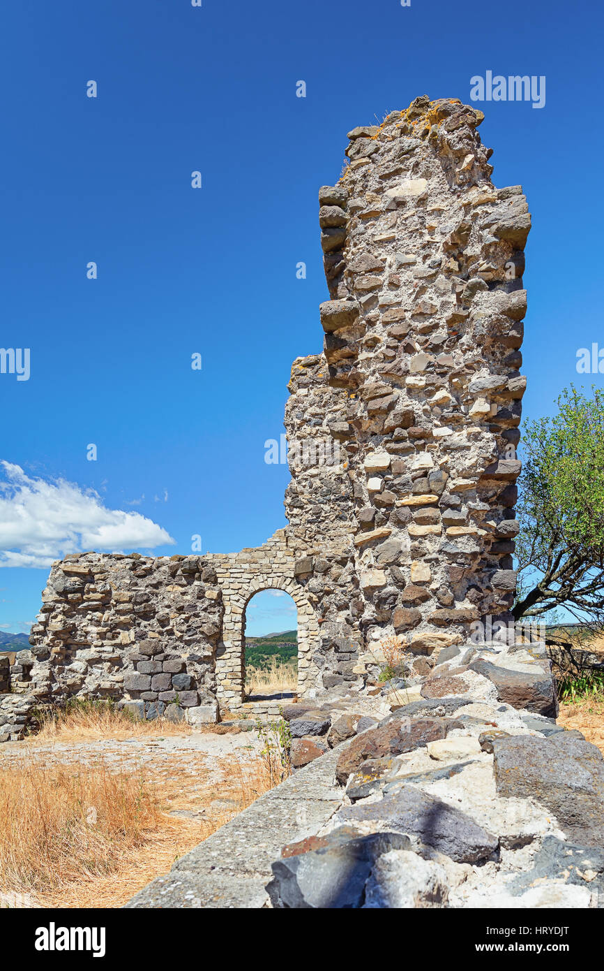 Basalt tower of castle ruin in Mirabel, Ardeche mountains, France Stock ...