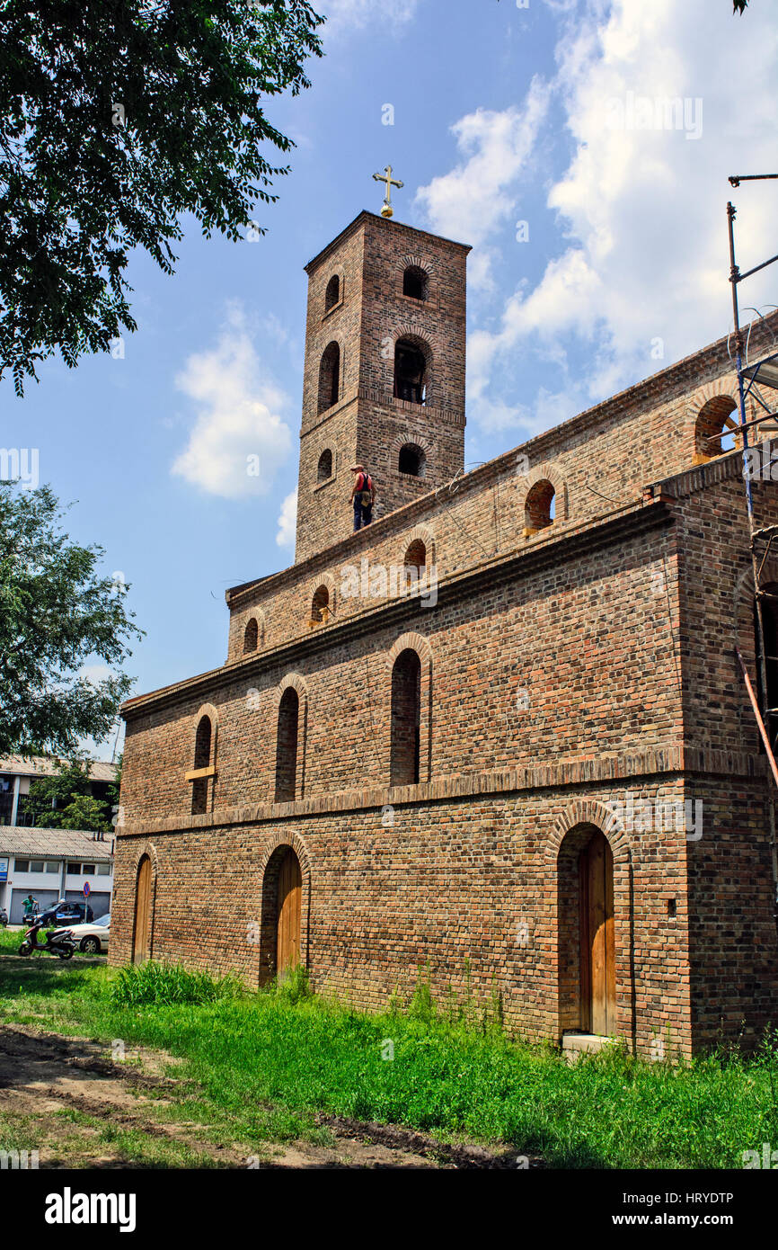 Brickwork of a new church in a populated area Stock Photo - Alamy