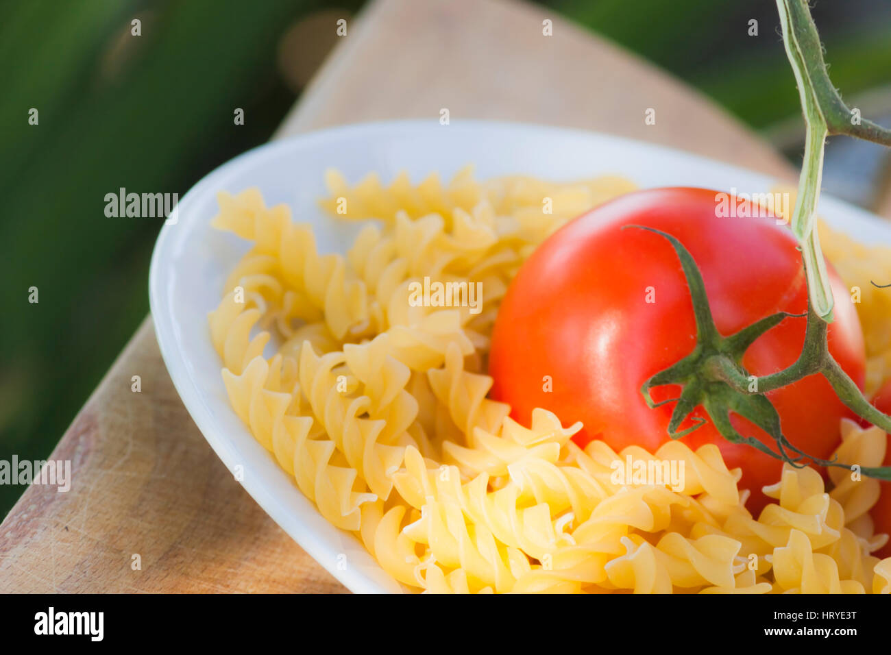 Italian fusilli pasta with tomatoes Stock Photo - Alamy