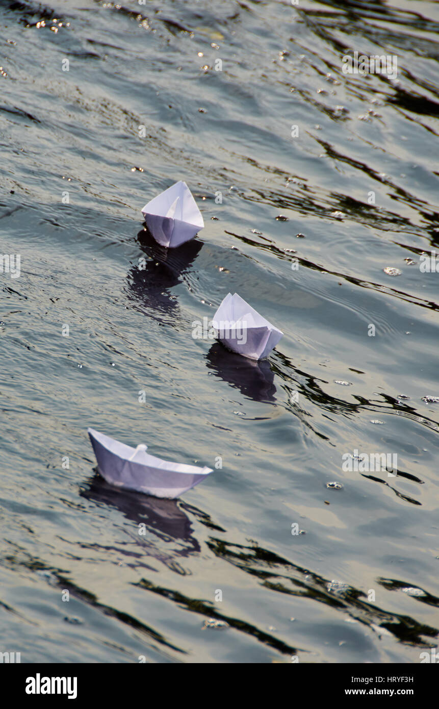 paper boat in heavy sea Stock Photo - Alamy