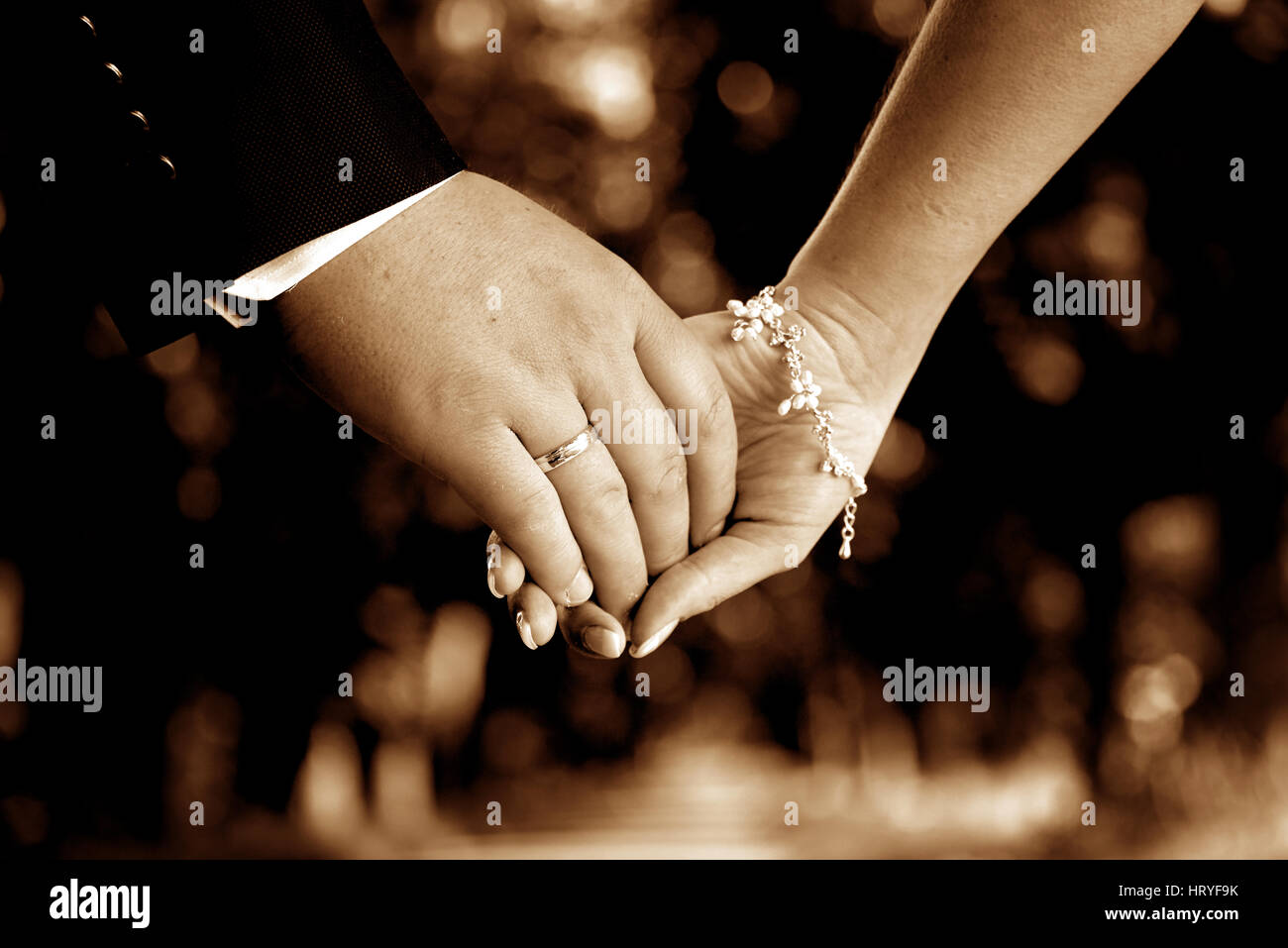 wedding couple hand in hand Stock Photo - Alamy