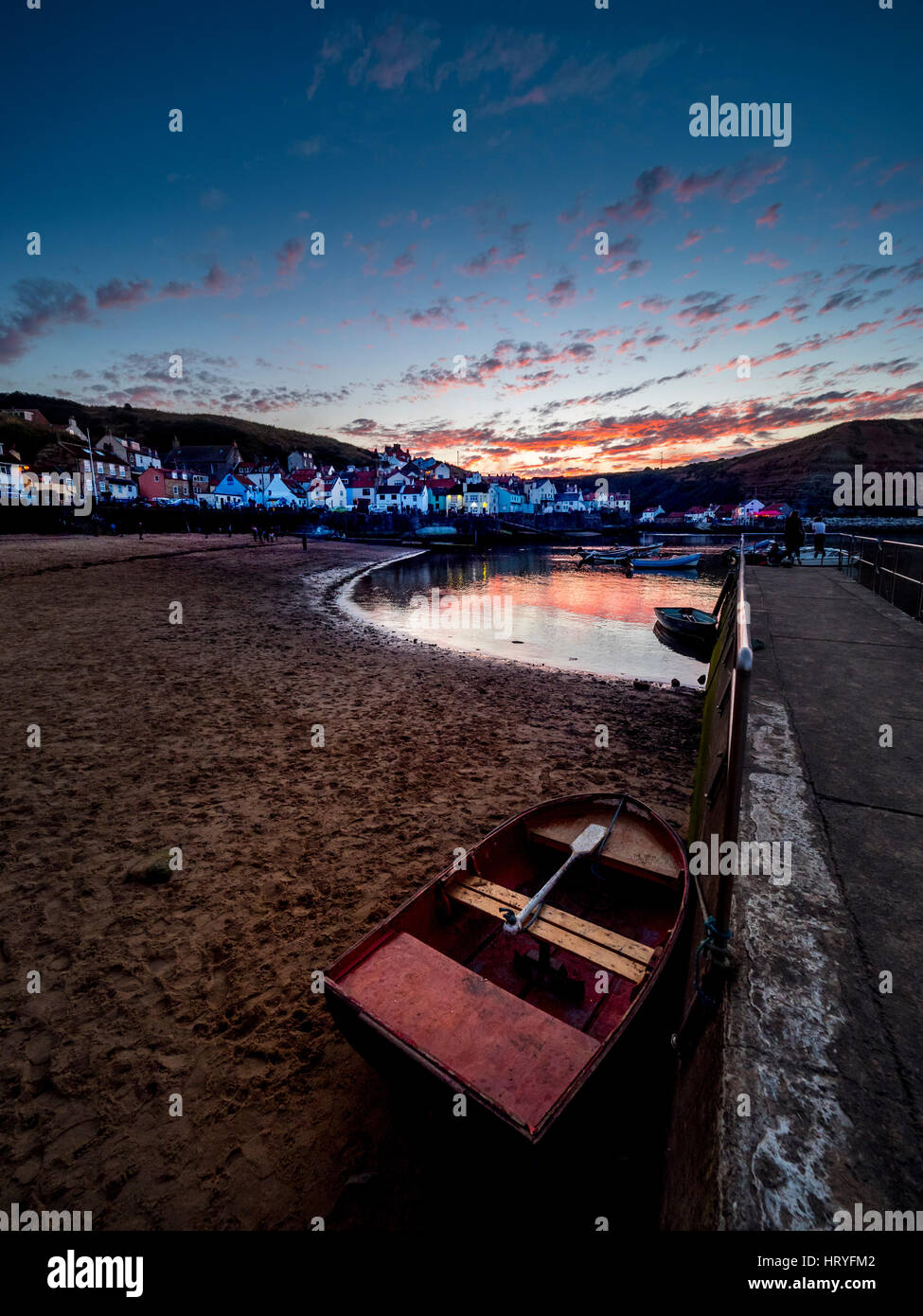 Staithes Harbour and Bay at sunset, North Yorkshire, UK Stock Photo - Alamy