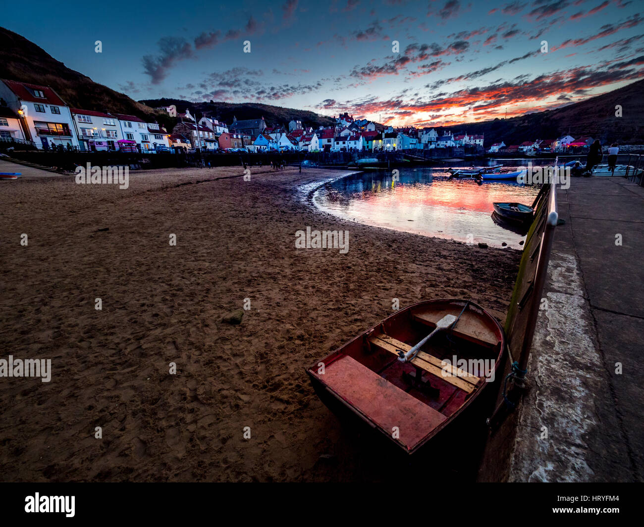 Staithes Harbour and Bay at sunset, North Yorkshire, UK Stock Photo - Alamy